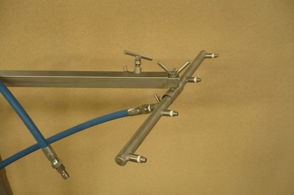 Rampe de lavage de tapis convoyeur - West Arc nettoyeurs haute pression